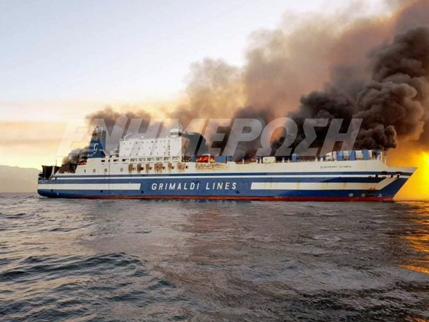 Passengers from burning ship being transferred to Corfu on two ferry boats